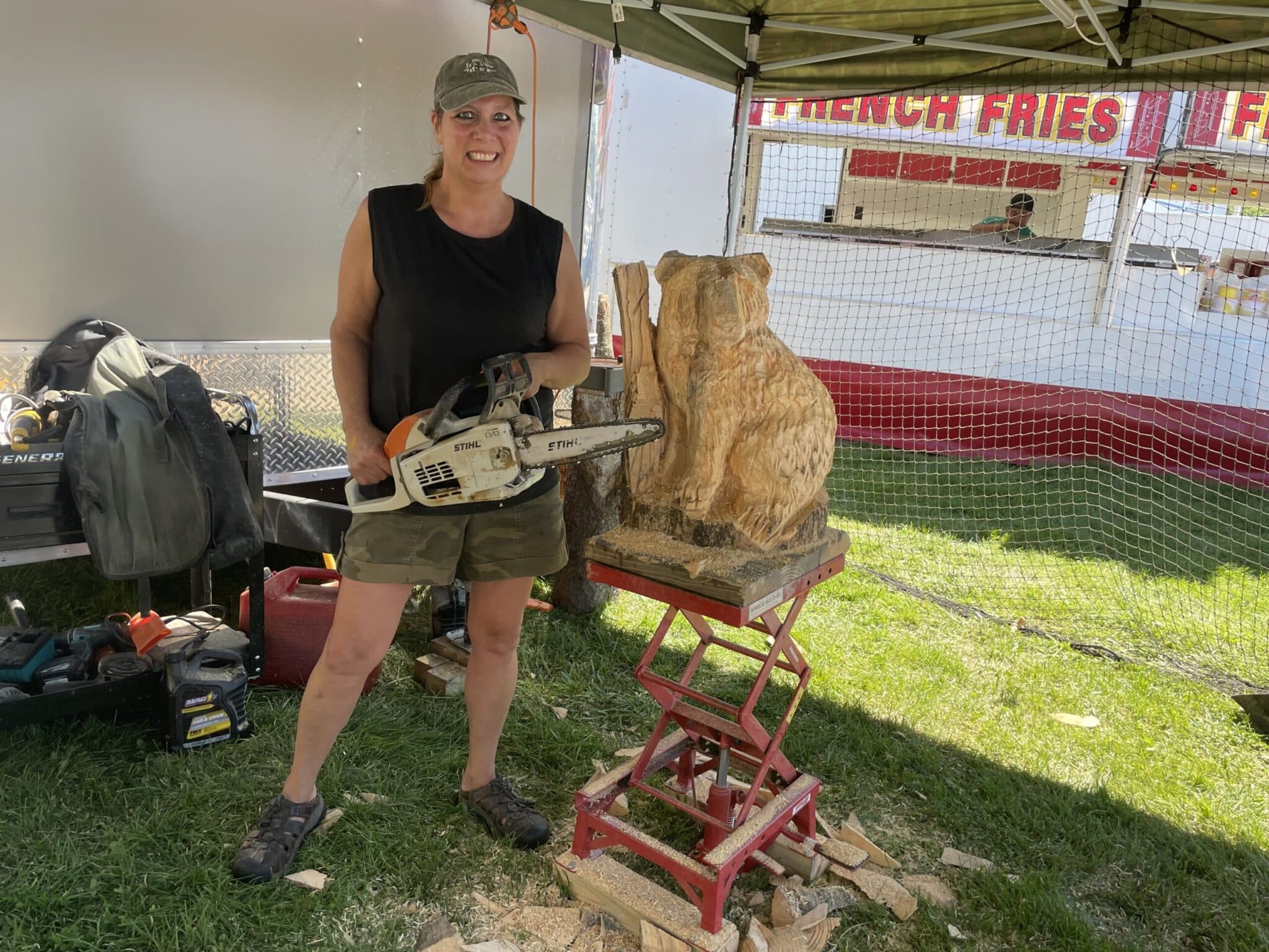 Chainsaw Shari Kicks up the Sawdust on Midway | Geauga County Maple Leaf